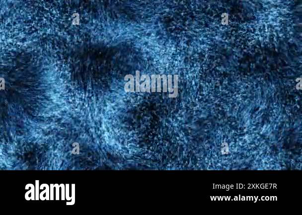 Small blue particles swirl against a dark background. The particles ...