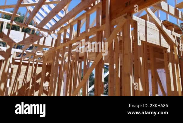 Wooden frame beam is used for framing during construction of new home ...
