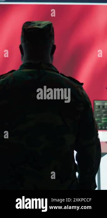 Vertical Video American army working in a command post with green ...