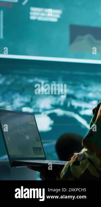 Vertical Video Military officer oversees surveillance and cybersecurity ...