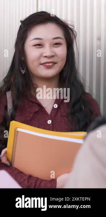 University students talking and having fun together after having ...