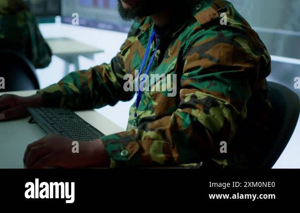 Army professionals in command post overseeing satellite data and real ...