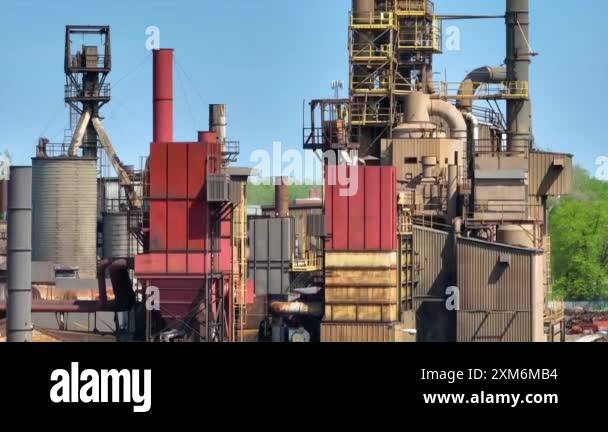 Aerial Pedestal Shot of an industrial complex in Warsaw Indiana. Towers ...