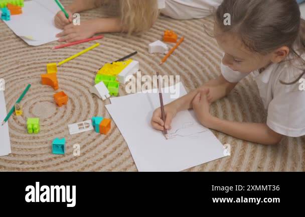 Group of kids visiting preschool classes. Young teacher and group of ...