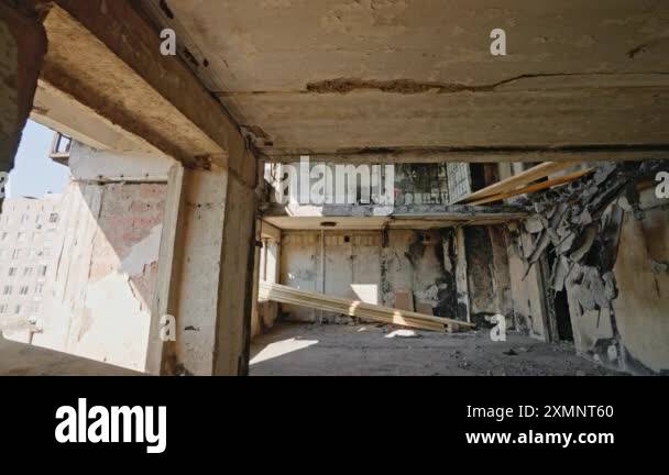 Scene captures aftermath of conflict, destruction in residential ...