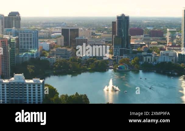 Orlando, Florida city architecture. Lake Eola Park and high-rise office ...