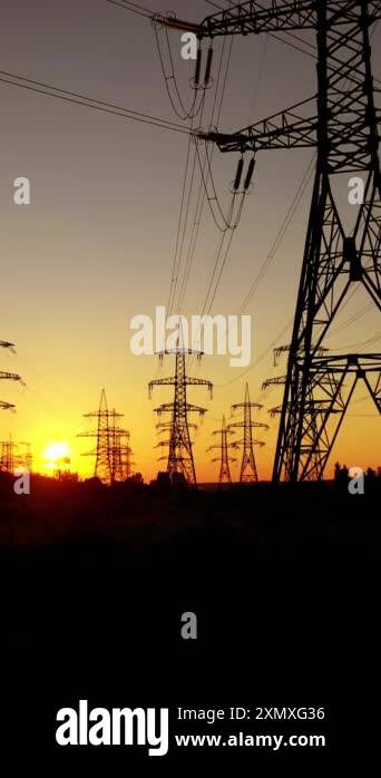 High voltage power lines sunset pylons transmission Stock Videos ...