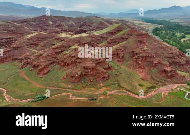 Red fairy chimneys shaped like formations that are millions of years ...
