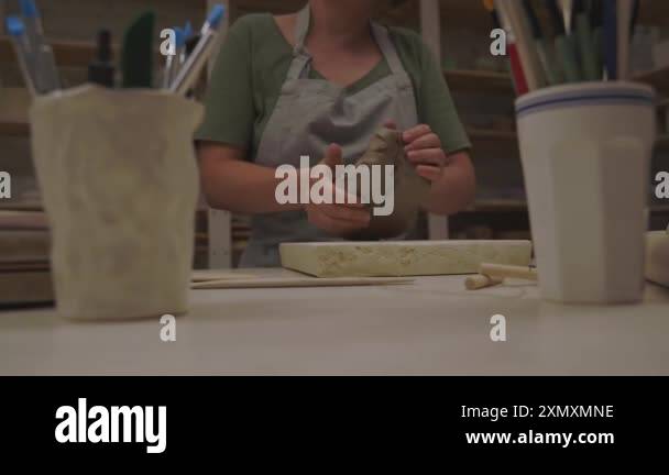 Removing air bubbles from clay before modeling to avoid the ruination ...