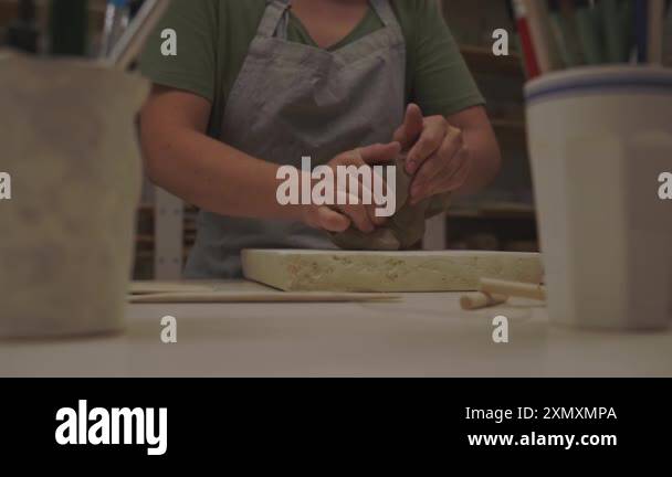 Removing air bubbles from clay before modeling to avoid the ruination ...