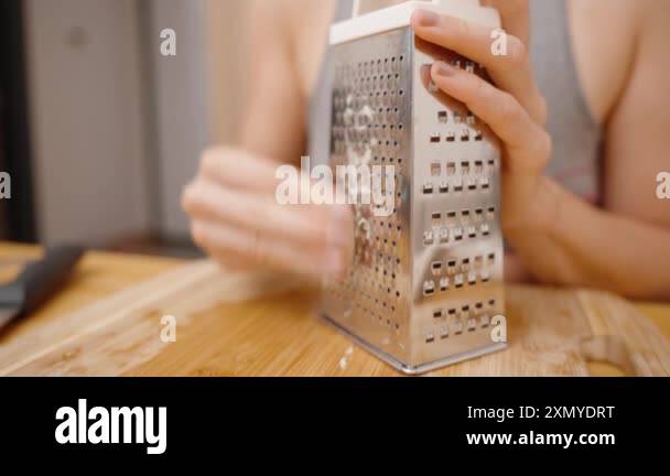 Grating garlic Stock Videos & Footage - HD and 4K Video Clips - Alamy