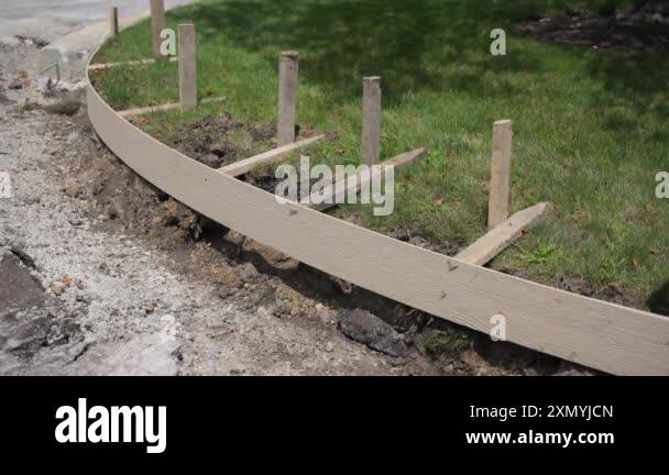 Concrete curb at road construction site. The road is ready to be ...