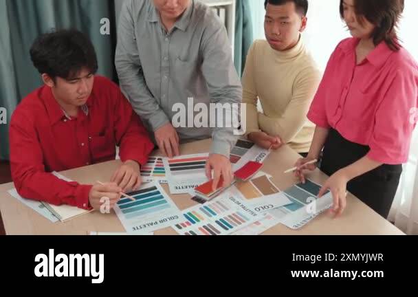 Designer team brainstorming and choosing color for graphic design ...