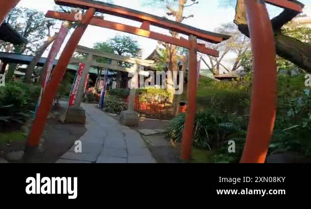 Enter the grounds of Hanazono Inari Shrine from the path with 1,000 ...