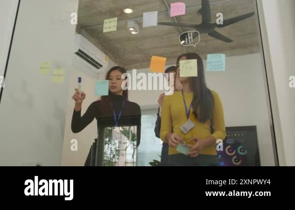 Team of business partner hot discussion and brainstrom about Ux Ui app ...