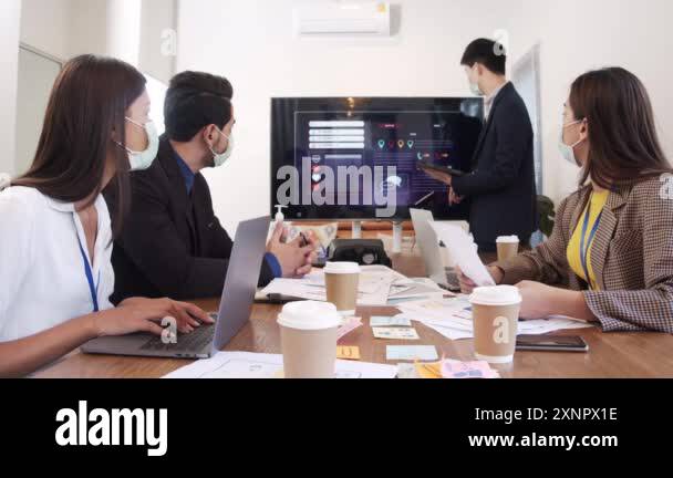 Team of business partner wearing face mask hot discussion and ...