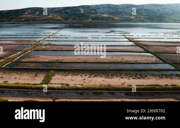 Shallow basins for sea salt production on Pag island in Croatia ...