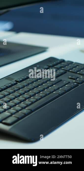 Vertical video Close up of computer peripherals used by engineers ...
