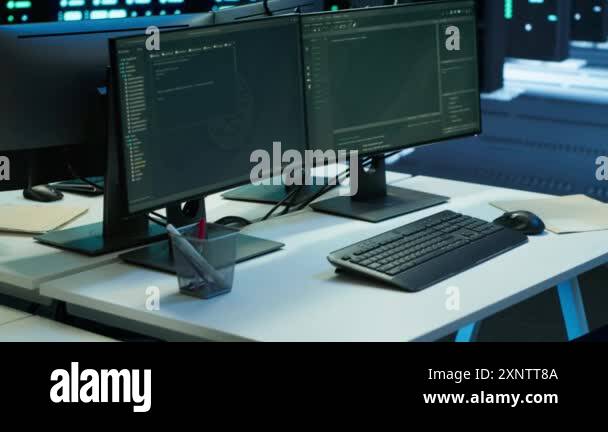 Data center workplace with networking systems installed used for managing infrastructure racks ...