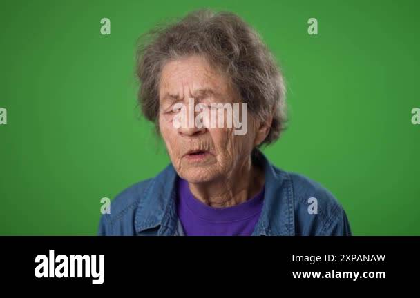 Tired depressed elderly mature toothless old woman 80s with migraine ...