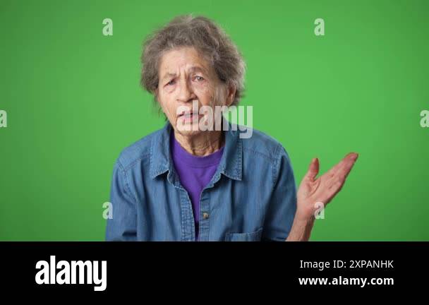 Unhappy irritated frustrated sad angry elderly senior old woman with ...