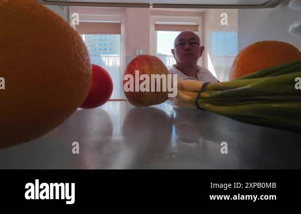 Stocking up fridge Stock Videos & Footage - HD and 4K Video Clips - Alamy