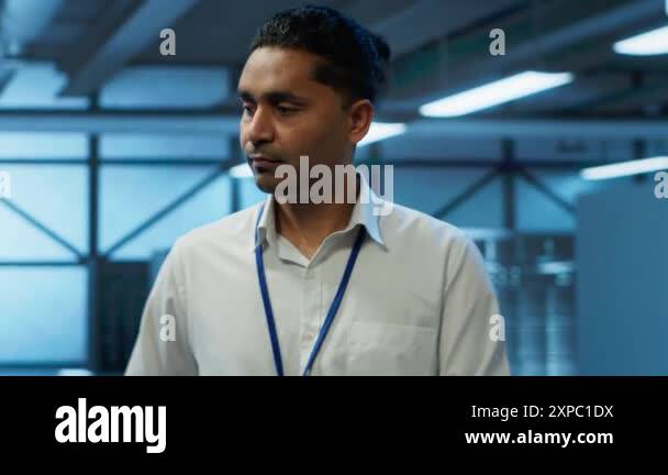 Engineer Walking In Data Center Monitoring Security Threats Implementing Cybersecurity