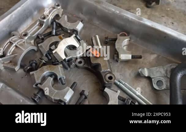 Bolts and parts of car engines. Parts of a car engine Stock Video ...