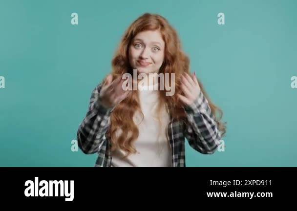 Beautiful woman in plaid shirt wear asks join her, beckons with ...