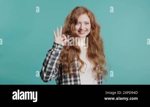 Pretty woman makes hand sign okay, ok gesture. Happy girl, correct ...