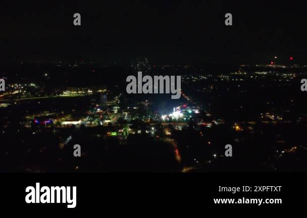 City Nightscape with Fireworks, An aerial view of a city nightscape ...