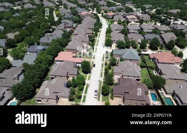 Residential street in upscale suburban neighborhood row of large ...