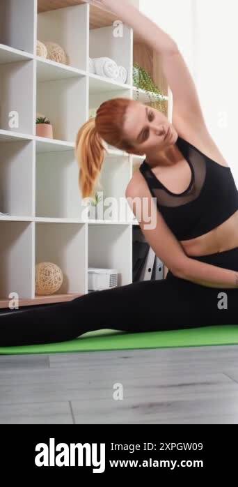 Vertical video. Home gymnastic. Stretch exercise. Morning workout ...