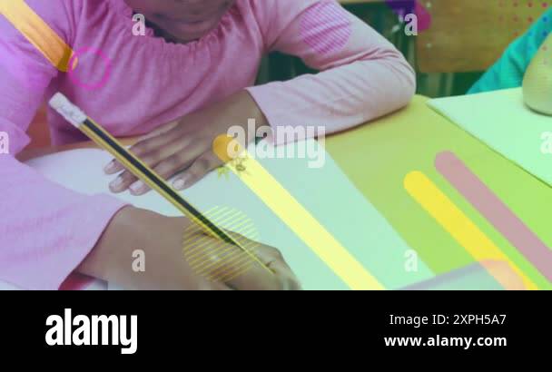 Colorful shapes animation over children studying in classroom ...