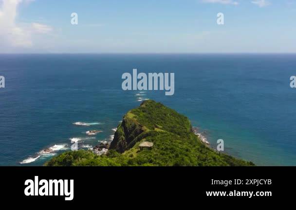 Tropical island cape and blue ocean. Cape Engano. Palaui Island. Santa ...