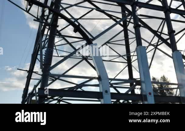 Electric tower and wires at sunset showcase the evolution of energy ...