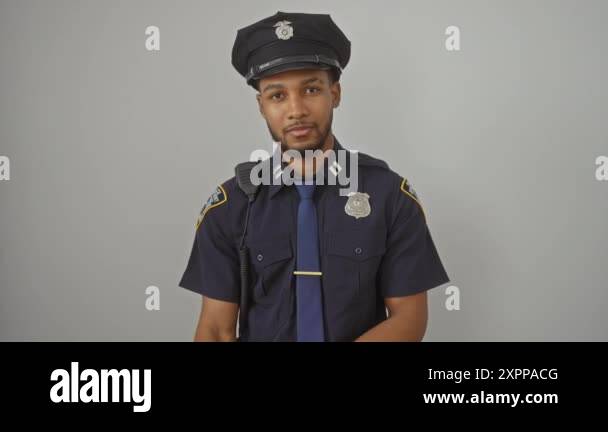 Positive-thinking african american male police officer, confidently ...
