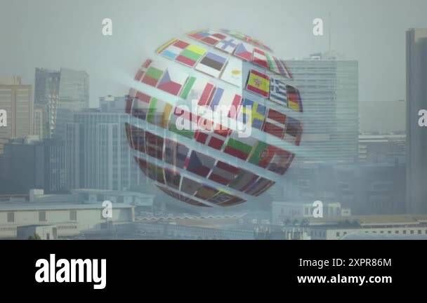 Rotating globe with international flags over cityscape background ...