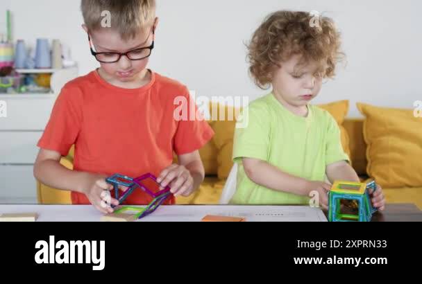 Little brothers build houses of magnets construction set details at ...