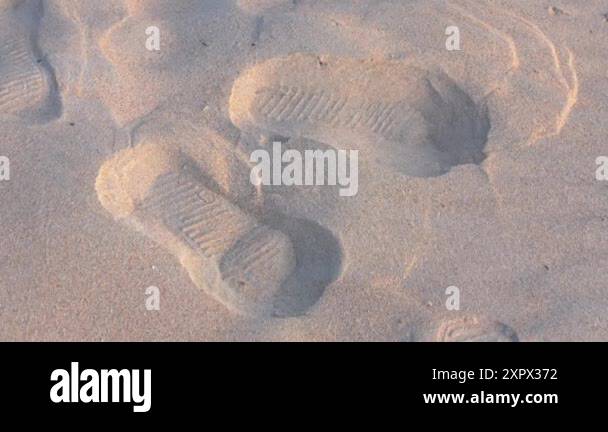 Footprints in sand detail footprints Stock Videos & Footage - HD and 4K ...