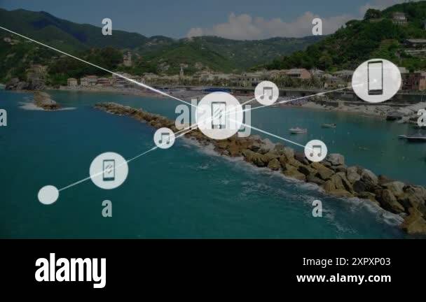 Music notes and devices animation over coastal town and beach ...