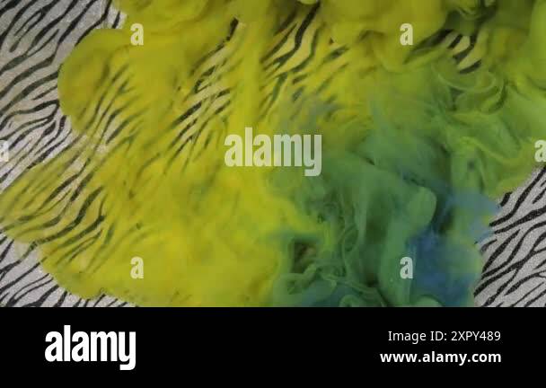 Mist floating. Paint water mix. Defocused green blue color glitter ...