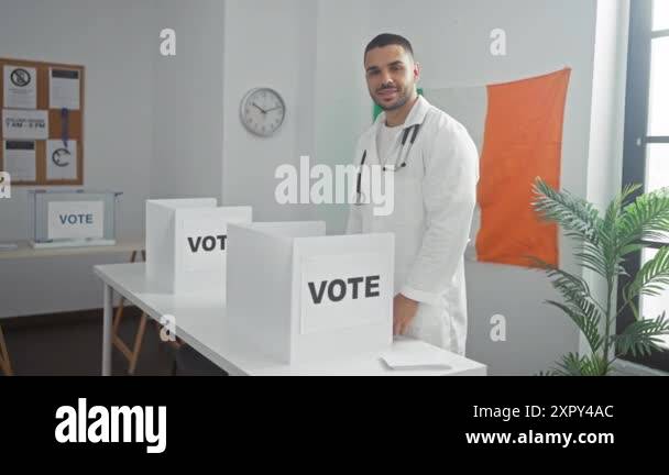 A smiling man with a stethoscope at an irish electoral college, giving ...