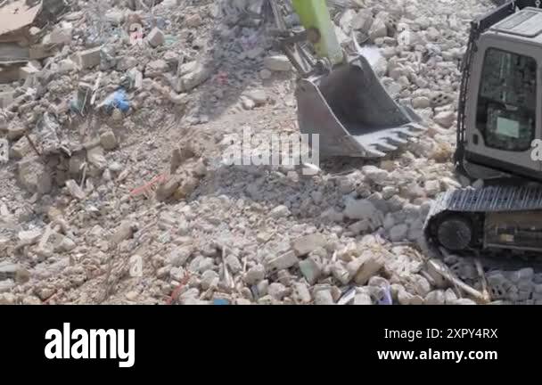 Demolition of residential buildings in Saudi Arabia Excavator loads and ...