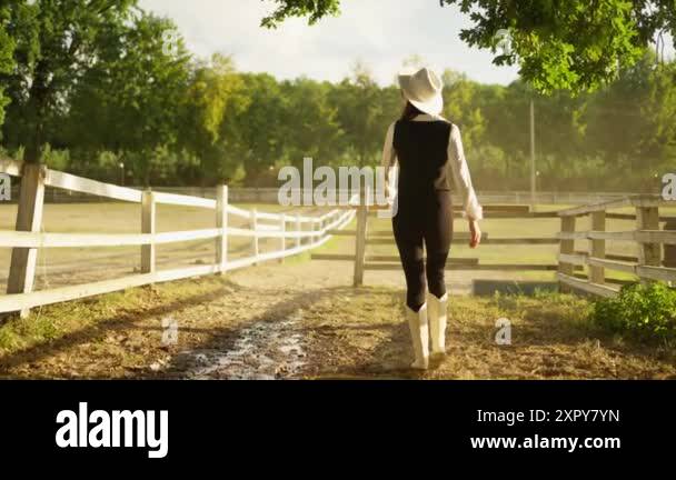 Woman riding horse back view hat Stock Videos & Footage - HD and 4K ...