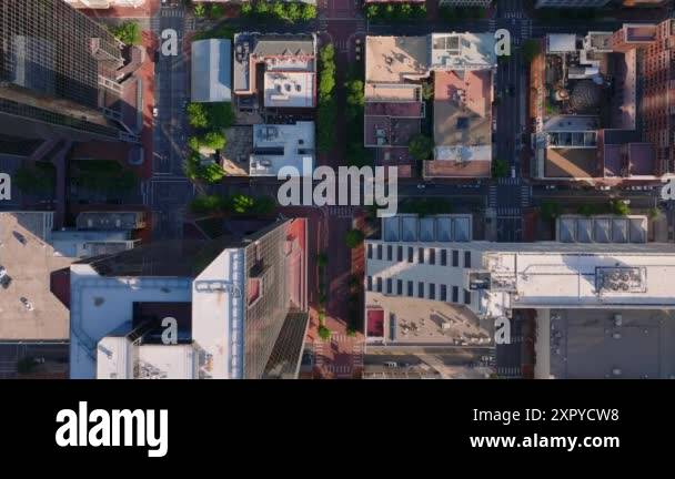 Birds eye view of urban architecture, skyscrapers rooftops and street ...