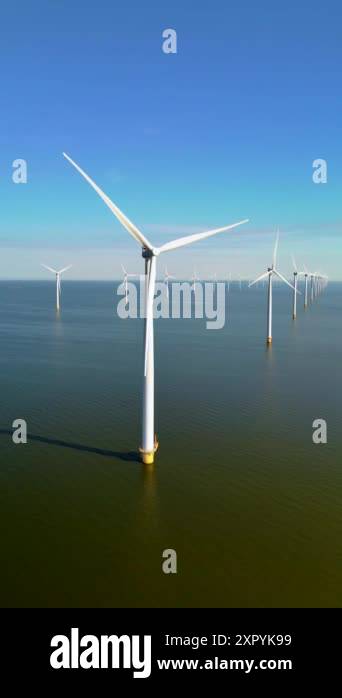 An aerial view shows the majestic offshore wind turbines in the ...
