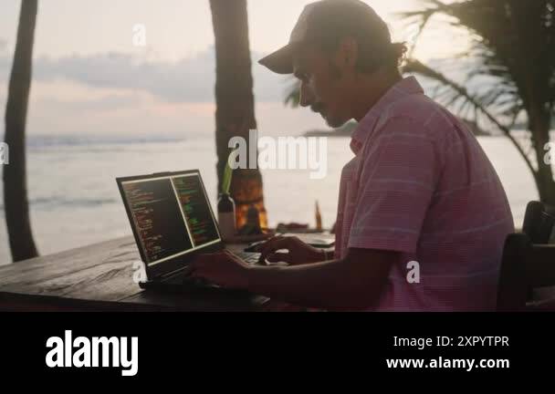 Male Coder Types Code Enjoys Remote Job With Ocean Background Software Developer Works On