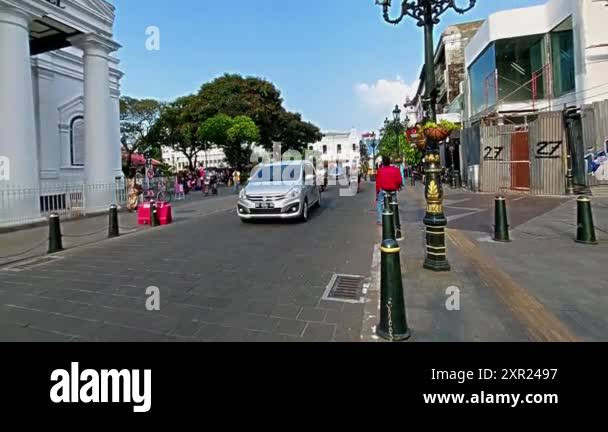 Semarang, Indonesia - 11022022: A busy street scene featuring a ...
