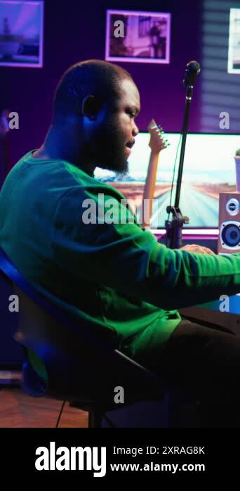 Vertical Video Artist playing piano electronic keyboard and recording ...